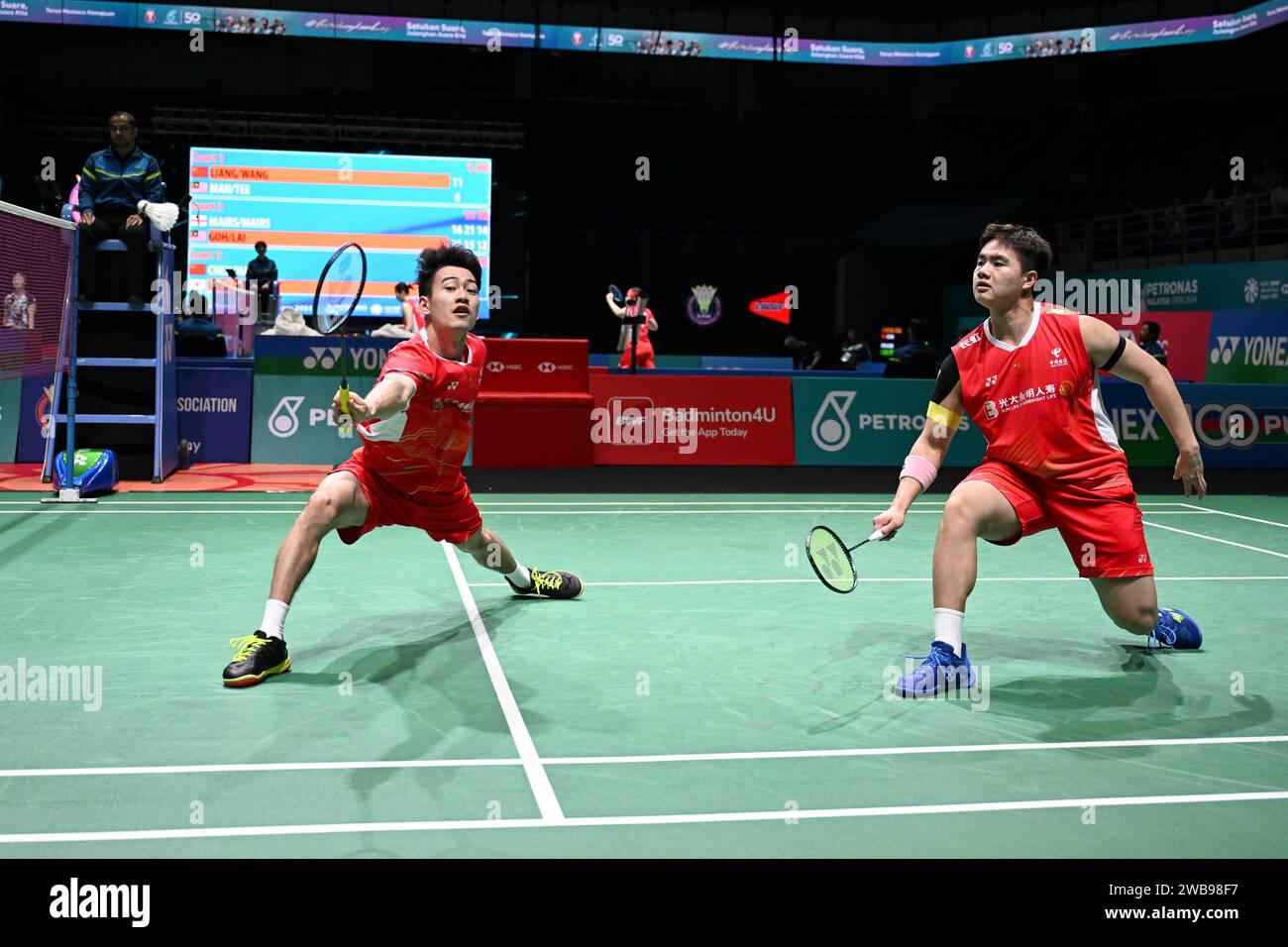 Kuala Lumpur, Malaysia. 9th Jan, 2024. Liang Weikeng (R)/Wang Chang compete during the men's ...