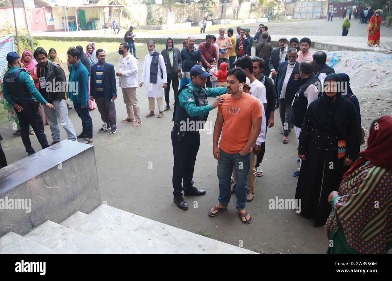 Voters queue in front of a polling center at Donia College Polling ...