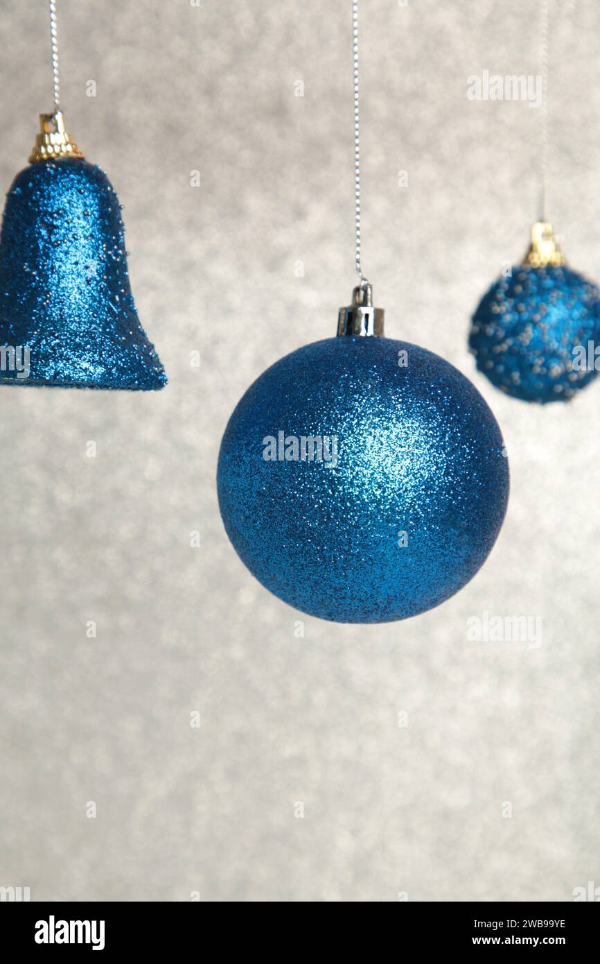Shiny blue Christmas balls on glittering background. Top view Stock ...