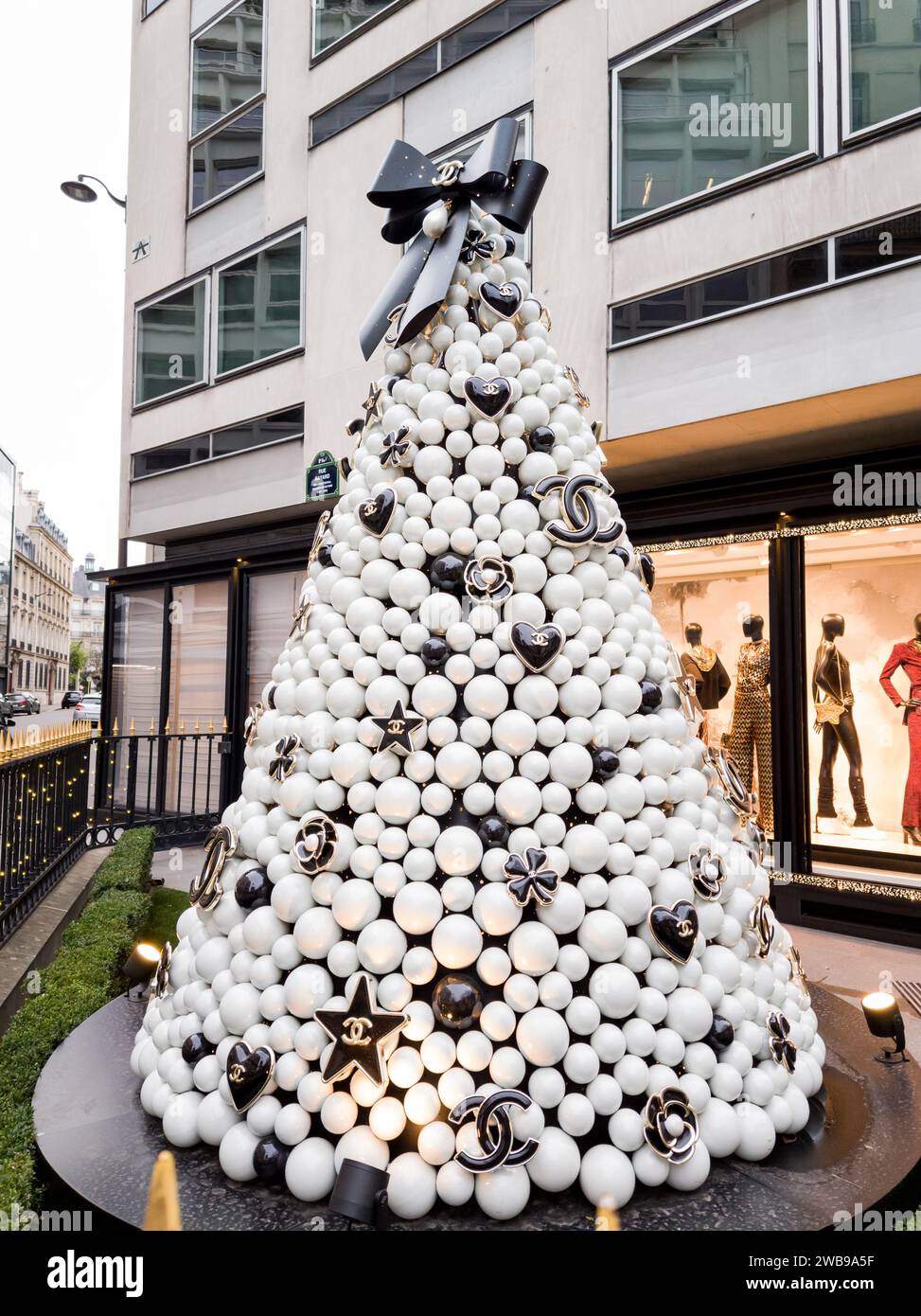 France, Paris, January 09, 2024 - Chanel facade and Christmas tree on ...