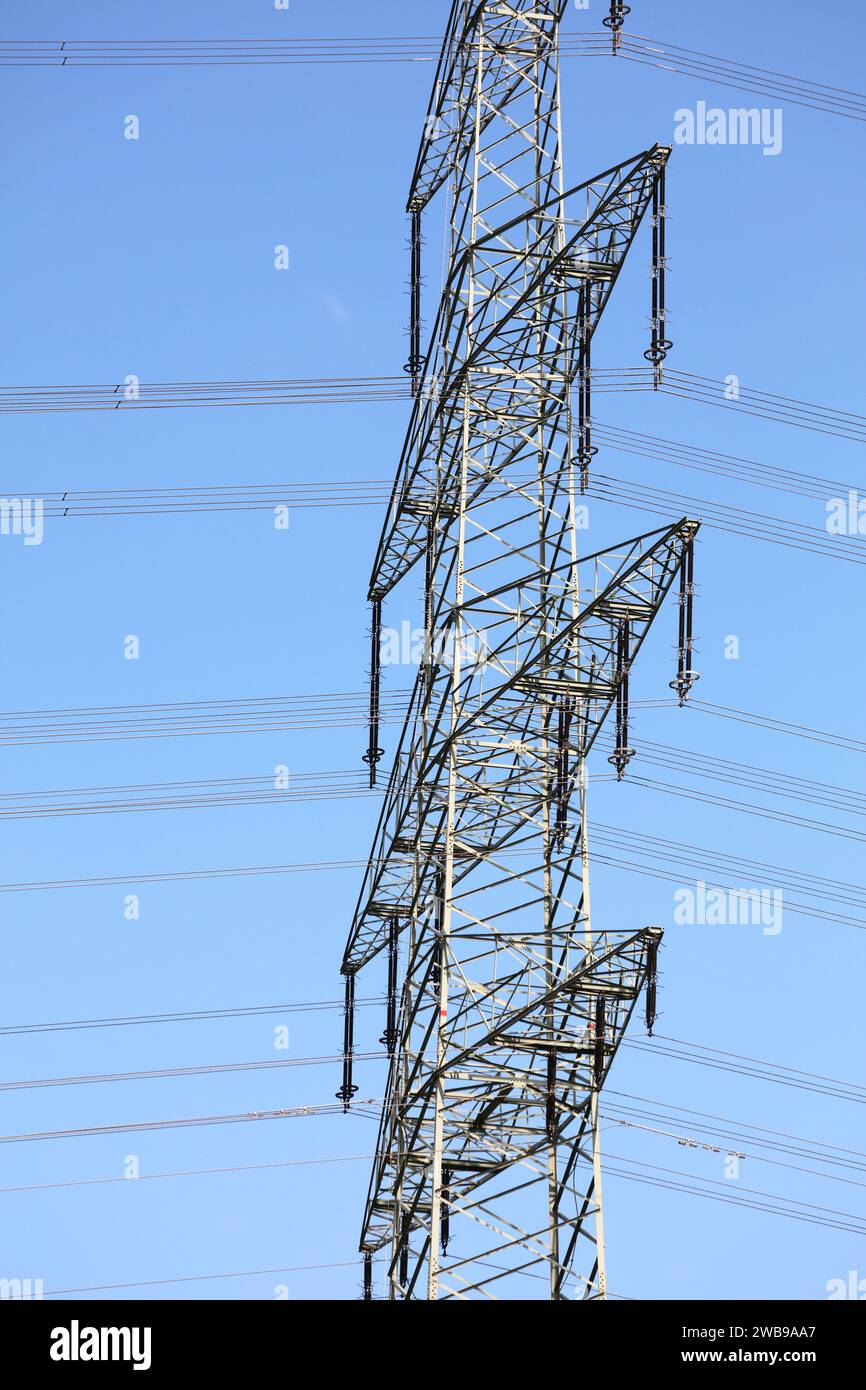 High tension power lines. Electric grid pylon in Gelsenkirchen, Germany ...