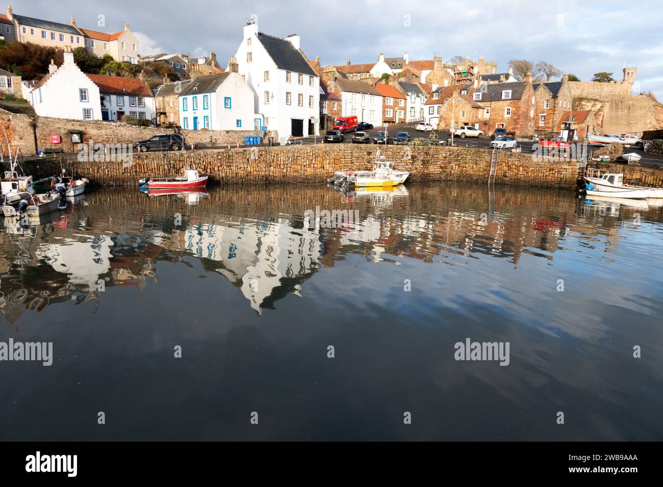 Pretty fishing village harbour and surrounding houses of Crail in Fife ...