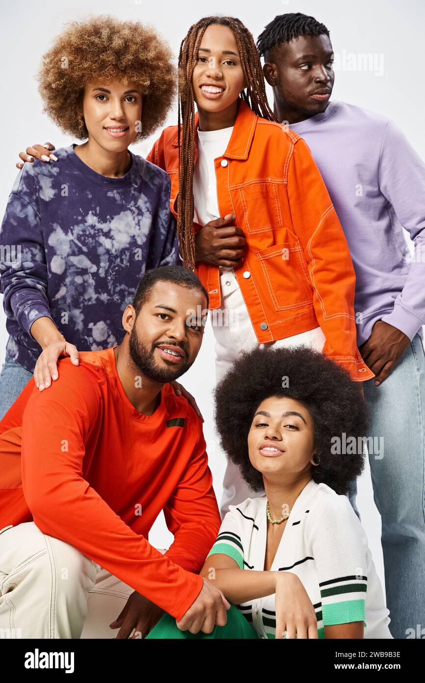 happy african american friends in casual wear spending time together on ...