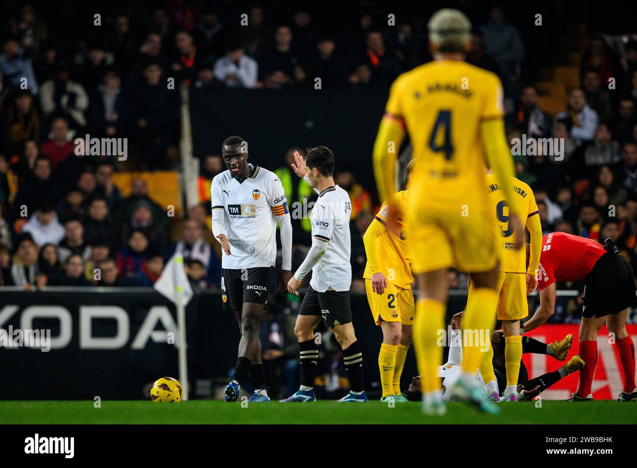 Valencia CF and FC Barcelona football players during a La Liga match at ...