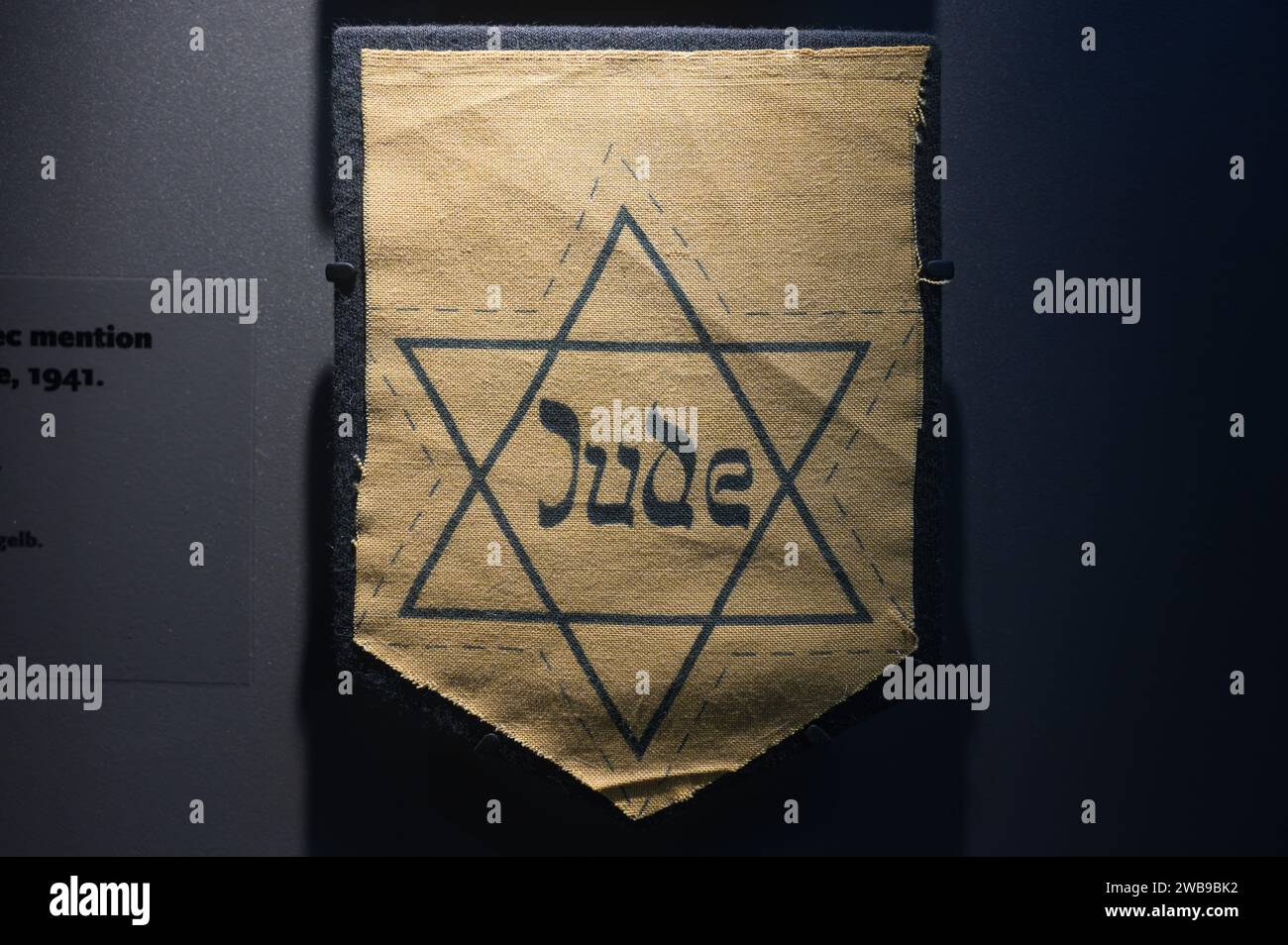 Detail of the Jewish symbol on a textile flag on a black background ...
