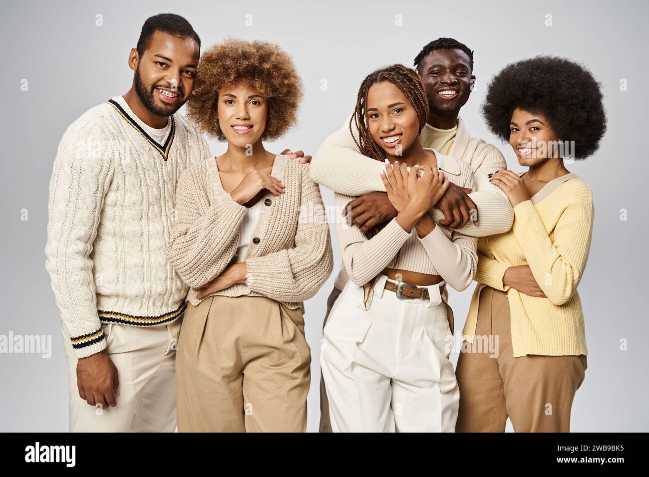 group of cheerful african american people in casual attire standing on ...