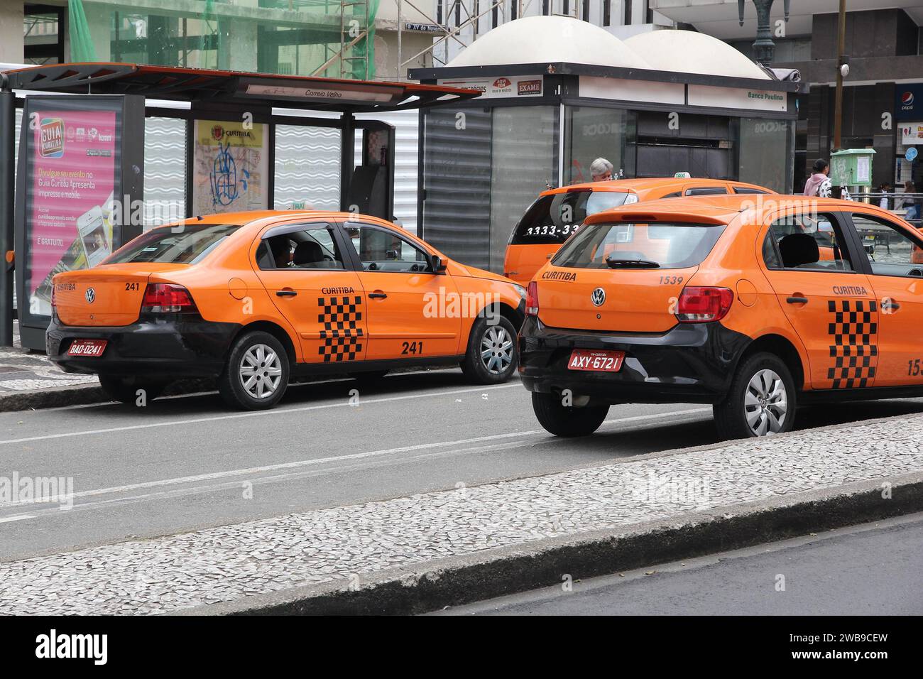 CURITIBA, BRAZIL - OCTOBER 7, 2014: Taxi cabs drive in Curitiba, Brazil ...