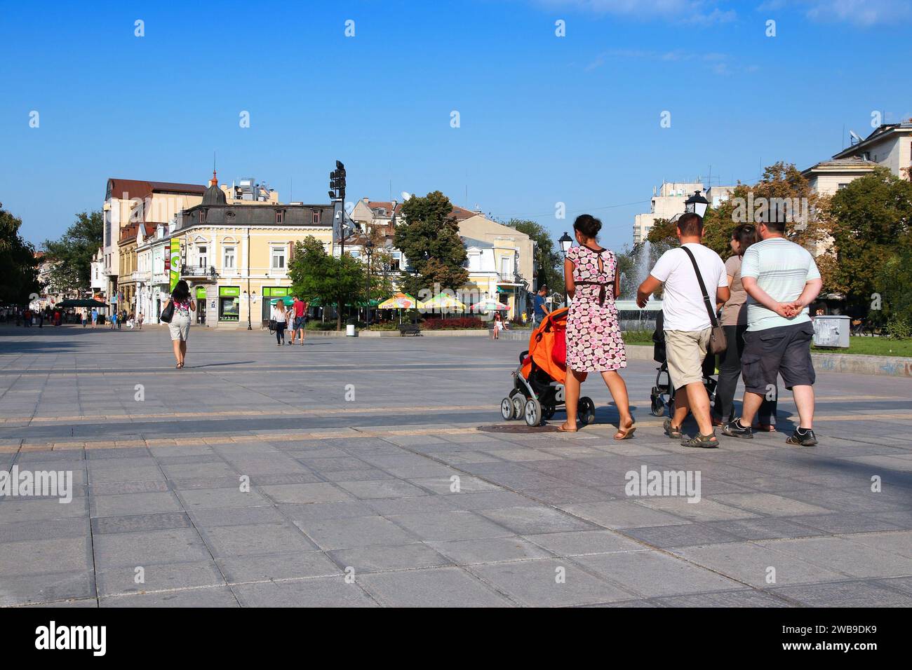 ROUSSE, BULGARIA - AUGUST 18, 2012: People visit the main square in ...
