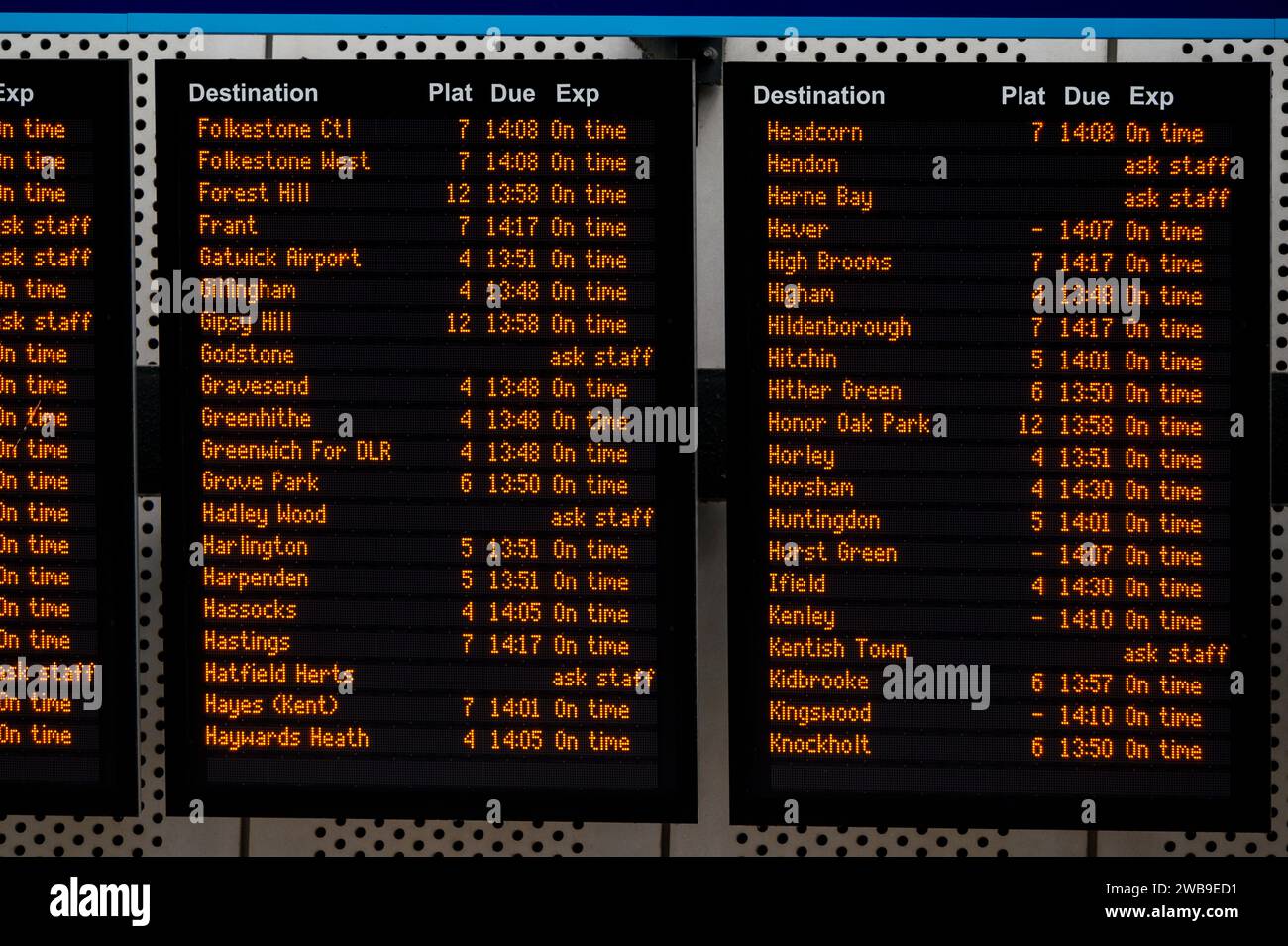 Digital destination display on a railway station platform, London ...