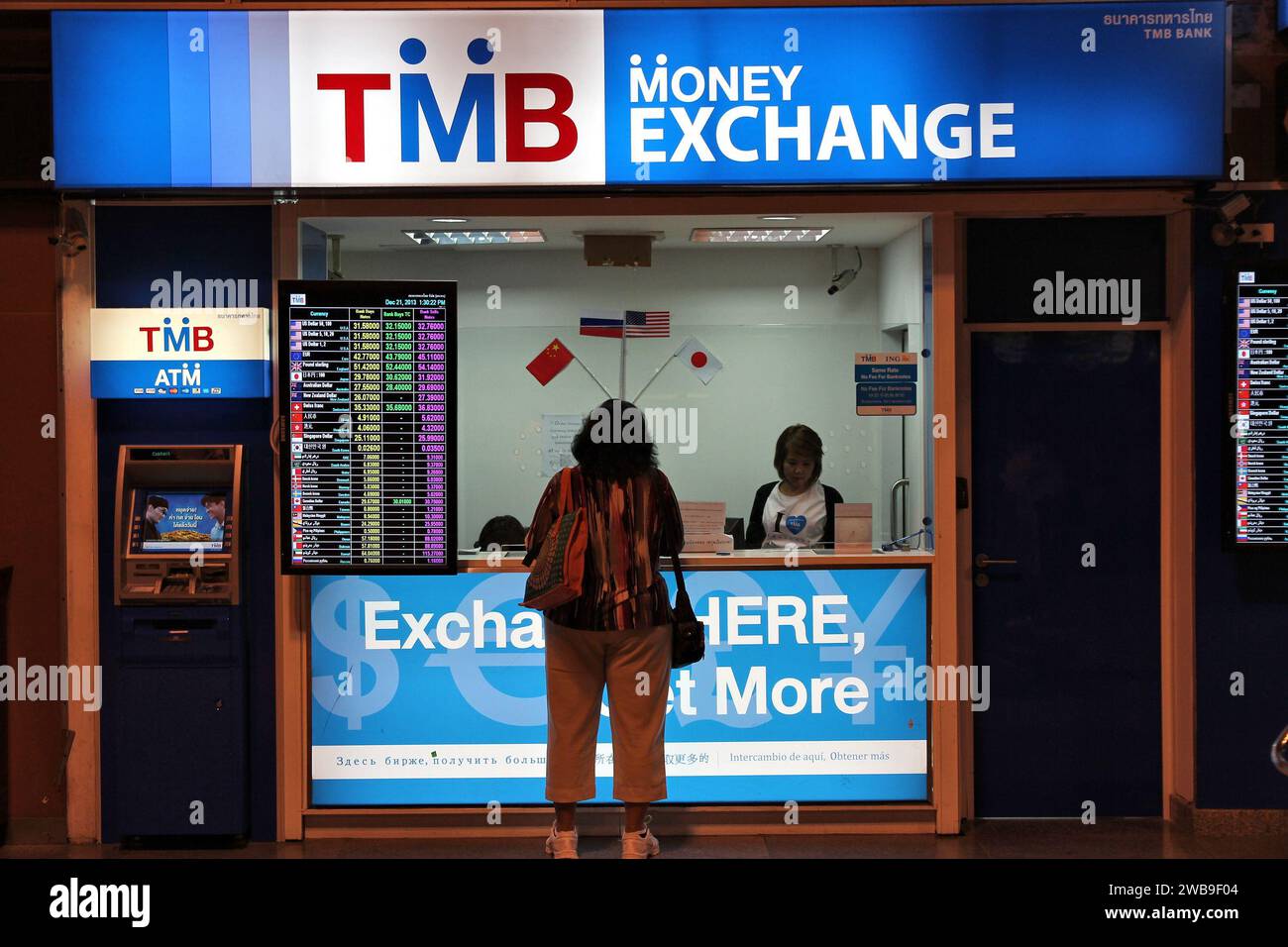 BANGKOK, THAILAND - DECEMBER 21, 2013: Traveler changes money at TMB ...