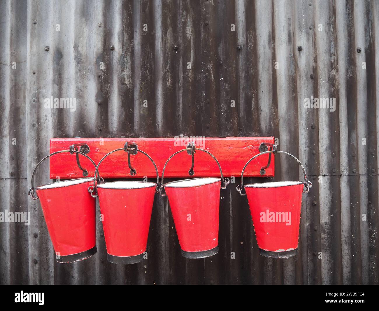 Red bucket hi-res stock photography and images - Alamy