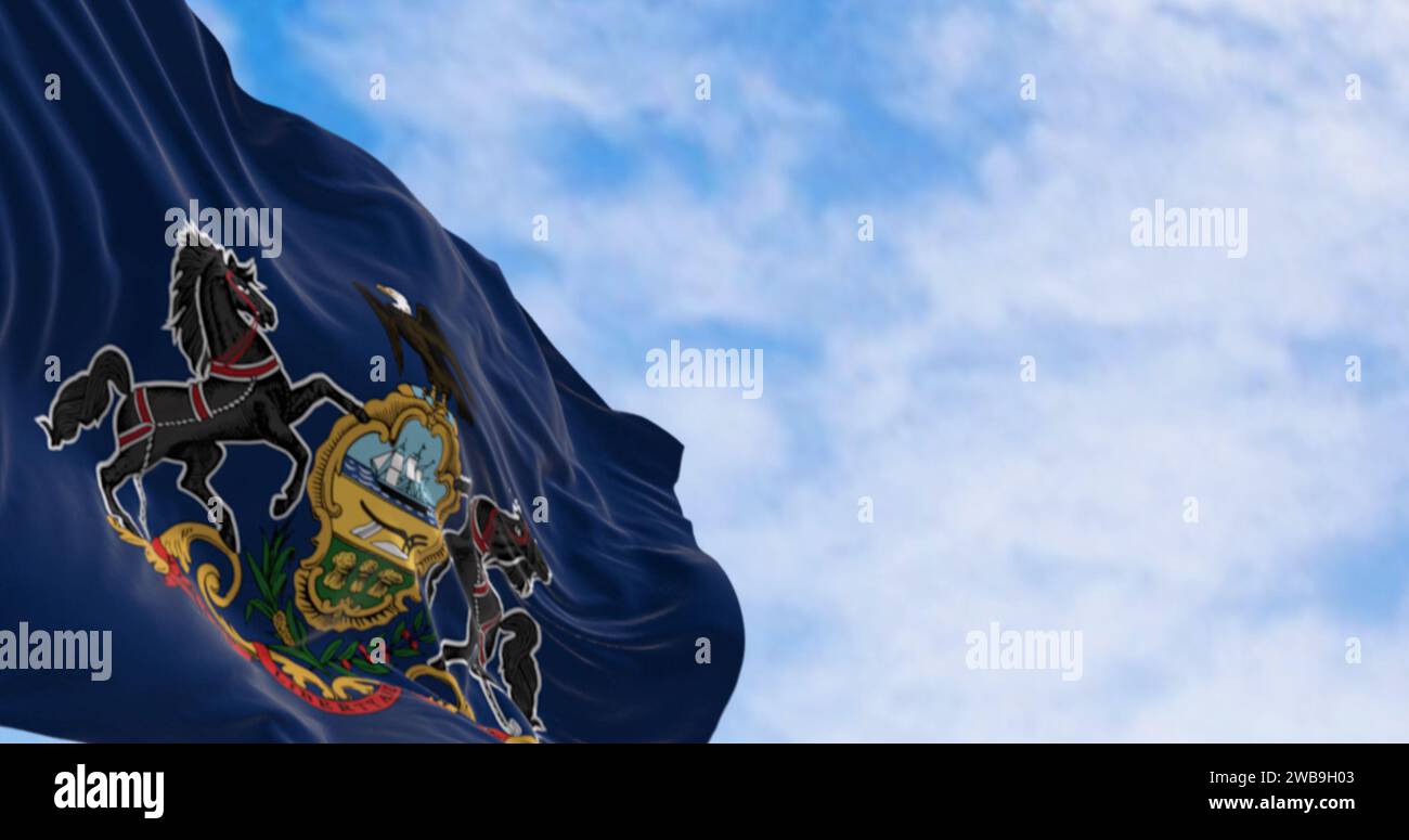Close-up of Pennsylvania state flag waving. Blue field with state coat ...
