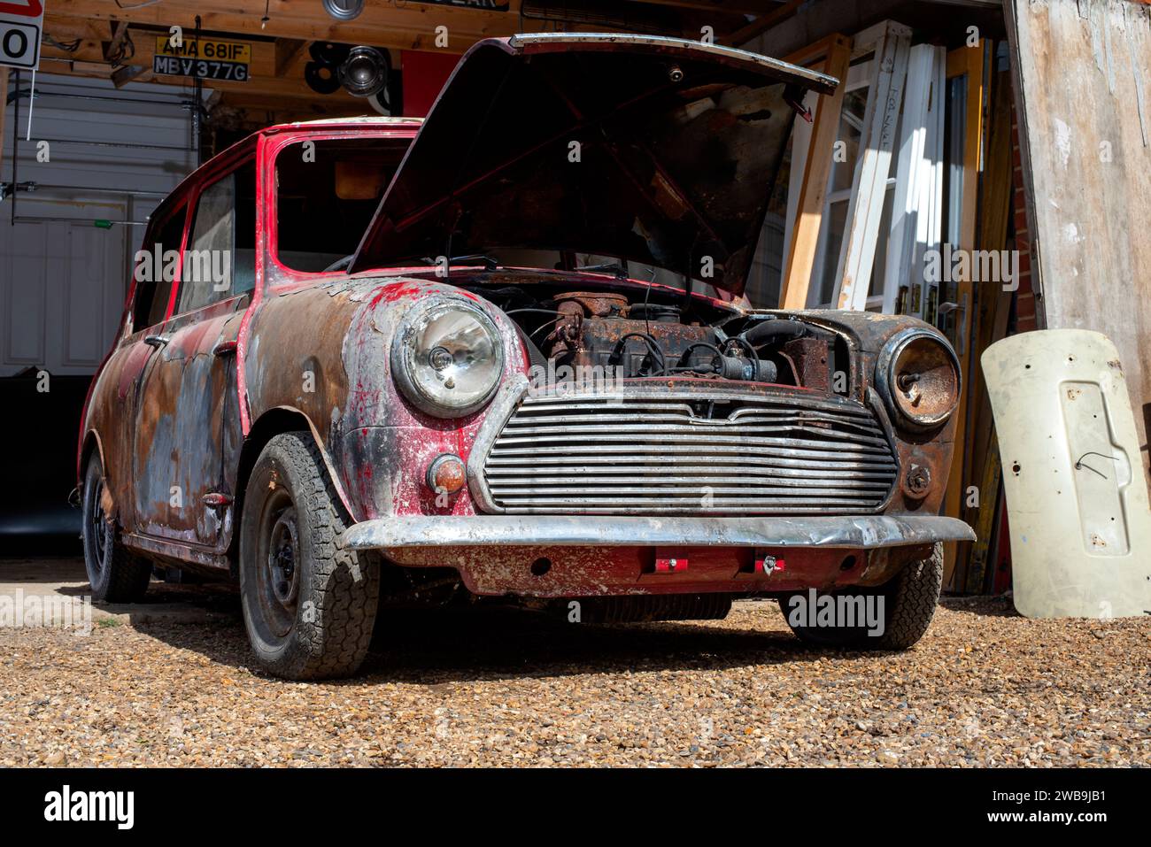 Fire damaged classic Mini car Stock Photo - Alamy