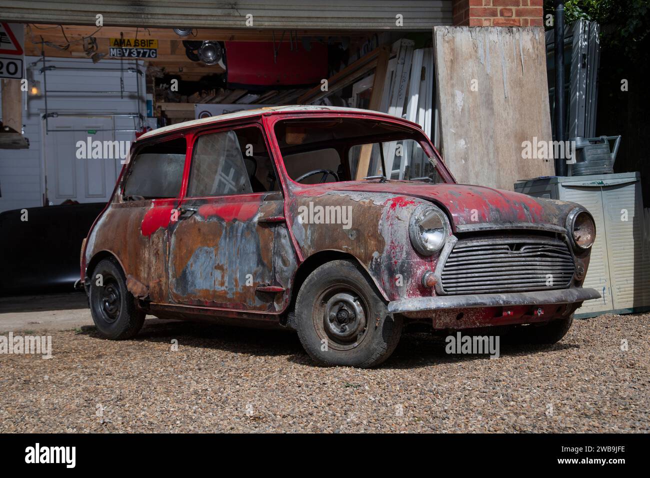 Fire damaged classic Mini car Stock Photo - Alamy