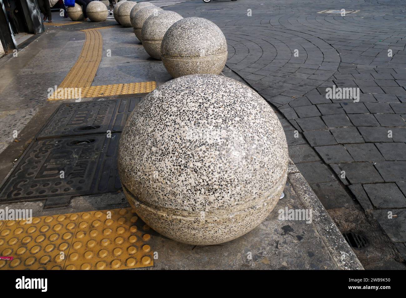 round stones on street sidewalks as urban planning architectural art ...