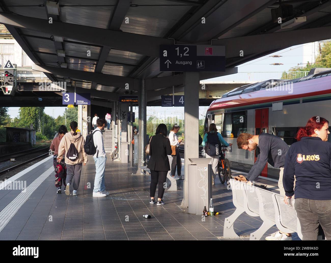 Covered train platform with incoming train hi-res stock photography and ...