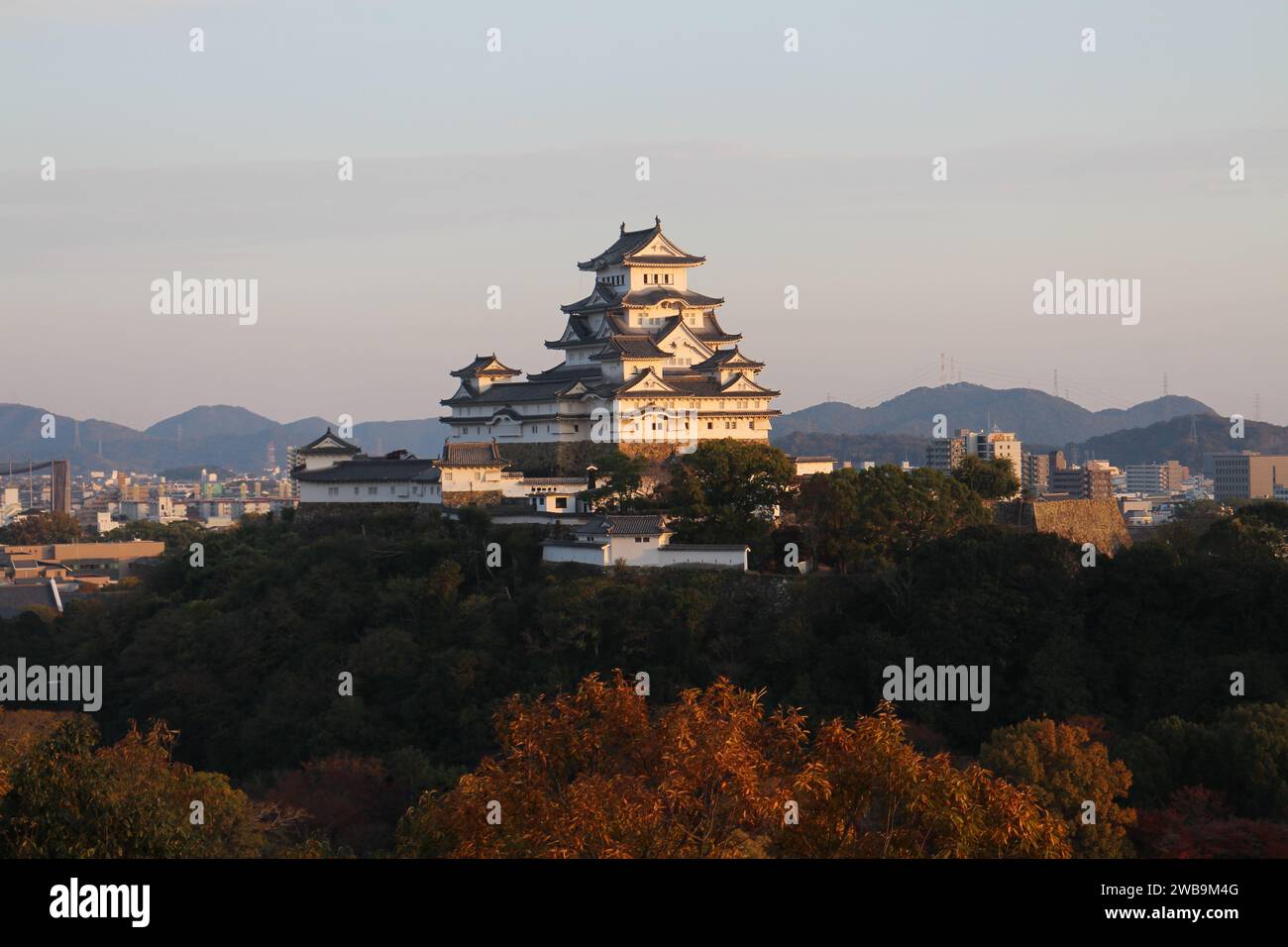 Himeji Castle in dusk viewed from Otokoyama Hill, in Himeji, Japan ...