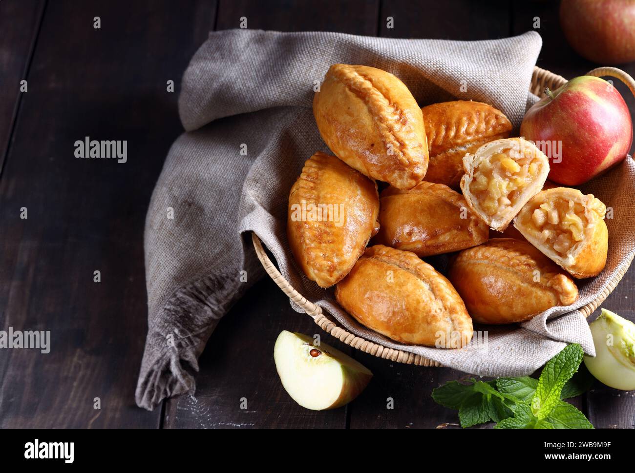 homemade mini pies with filling for snacks Stock Photo - Alamy