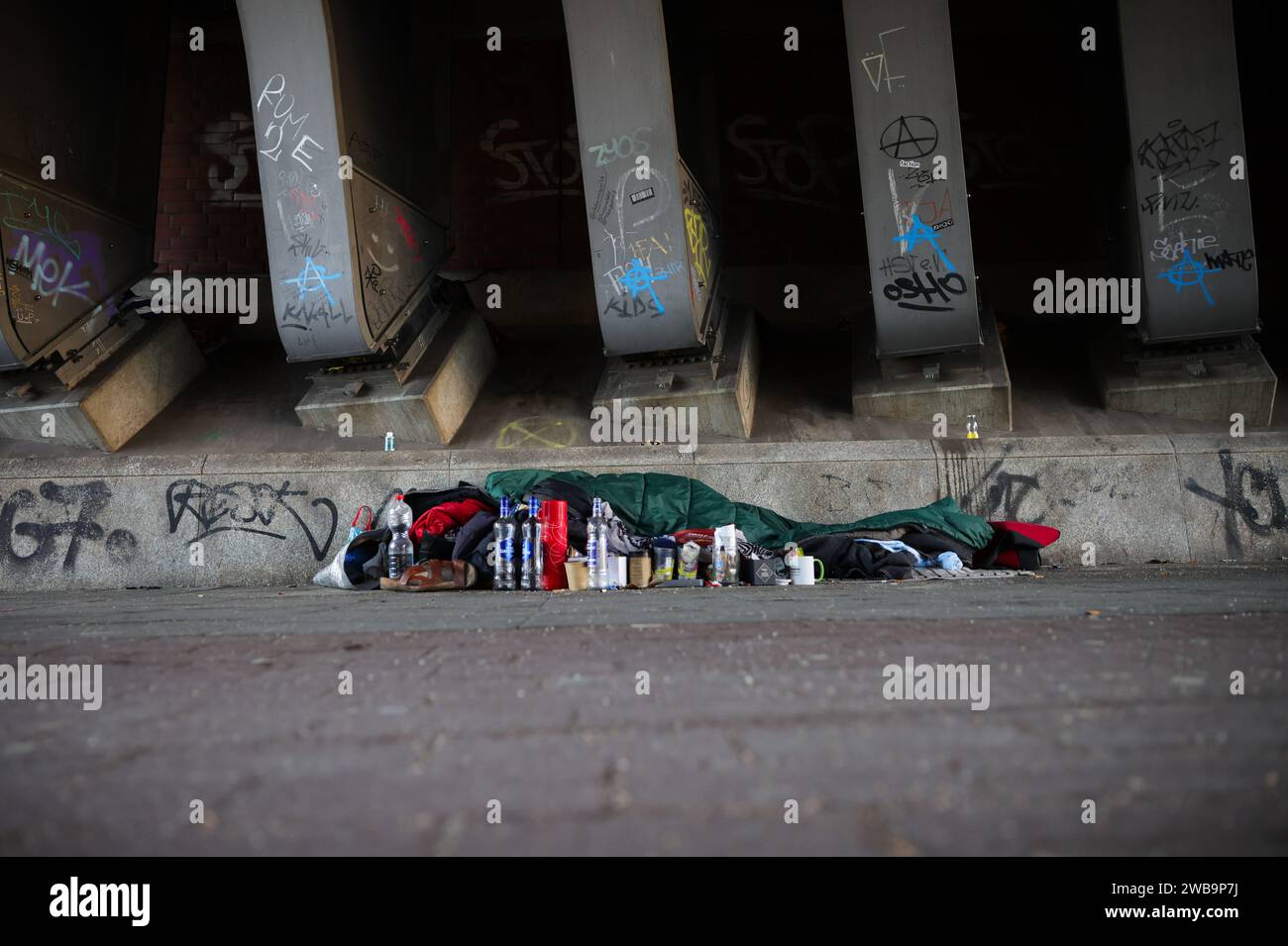 Homeless people sleeping under bridge hi-res stock photography and ...