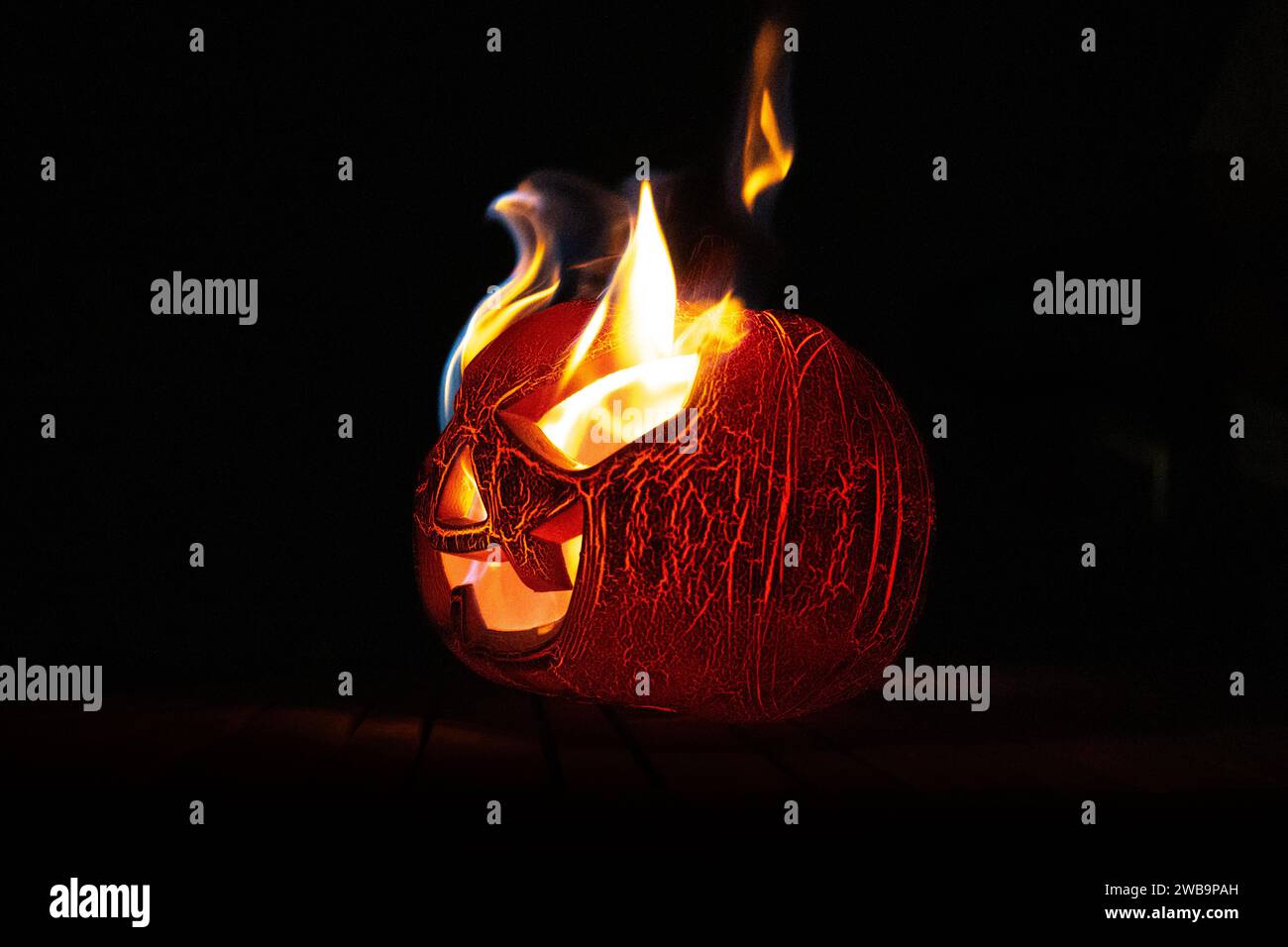 Pumpkin on fire Stock Photo - Alamy