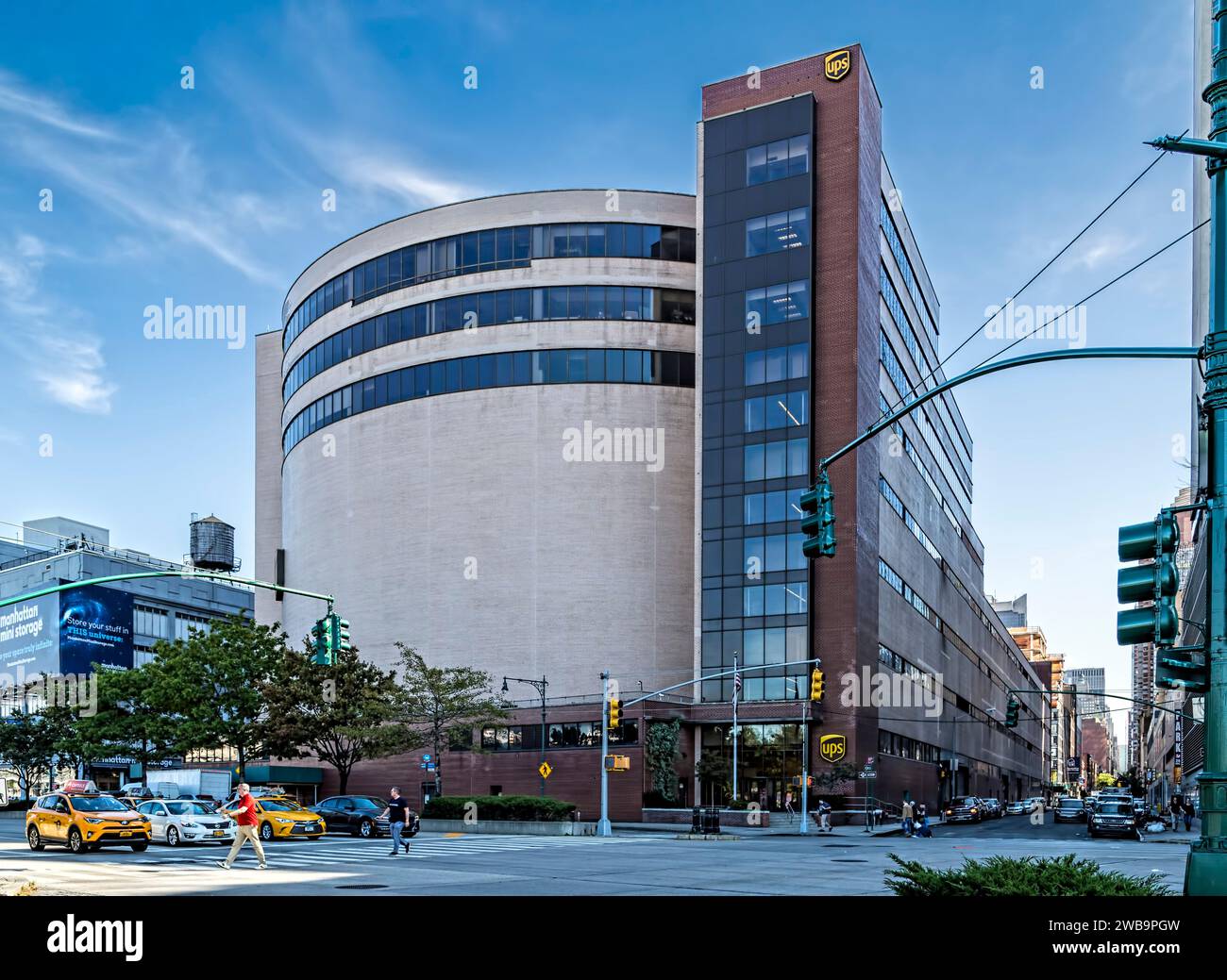 The UPS Service Center’s distinctive curved beige brick façade ...