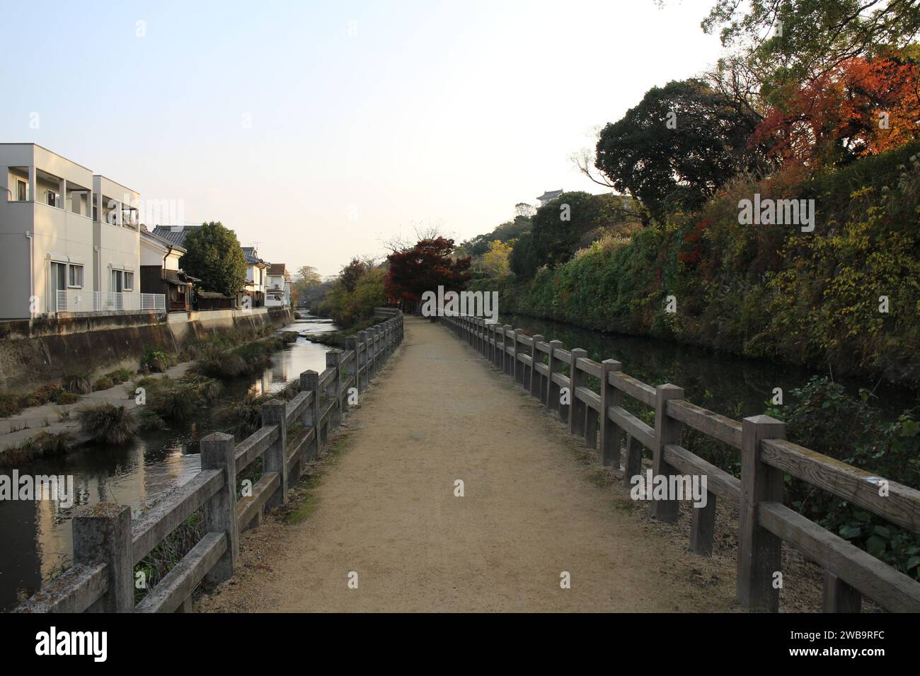 Senhime's path and autumn leaves in the early morning in Himeji, Japan ...
