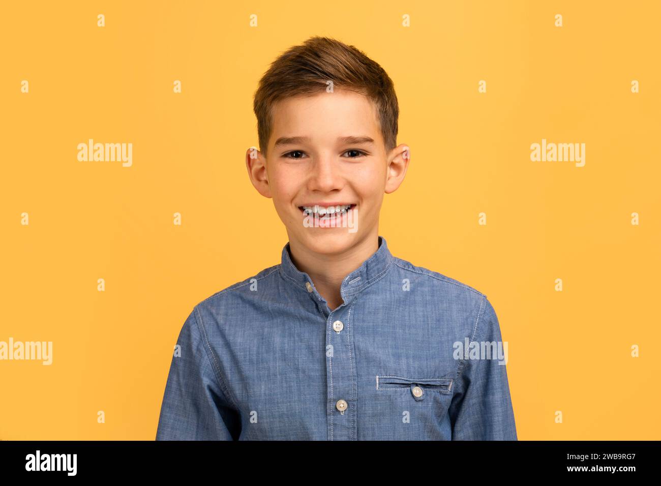 Handsome teen boy with happy smile looking at camera Stock Photo - Alamy