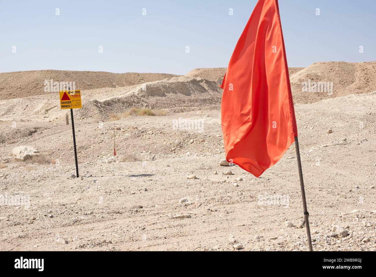 Minefields Sign with the text: Warning! Danger Mines in three languages ...