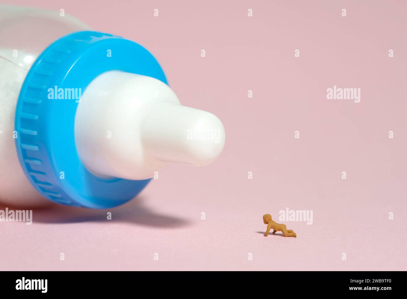 Miniature tiny people toy figure photography. A baby infant crawling ...