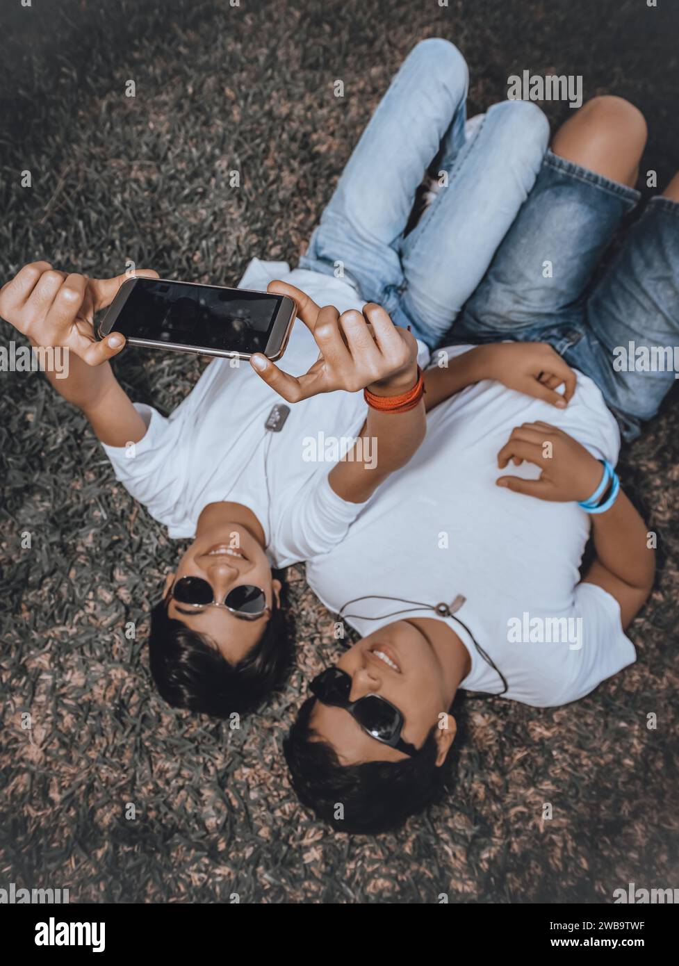 Happy friends making selfie outdoors Stock Photo - Alamy