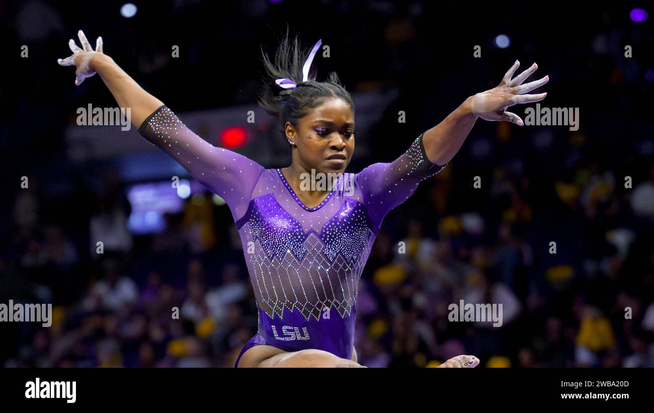LSU graduate student Kiya Johnson performs a balance beam routine ...