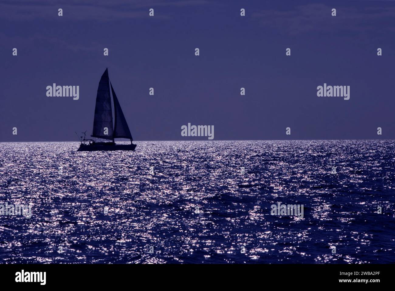 Moonlight sailing in the Bahamas Stock Photo - Alamy
