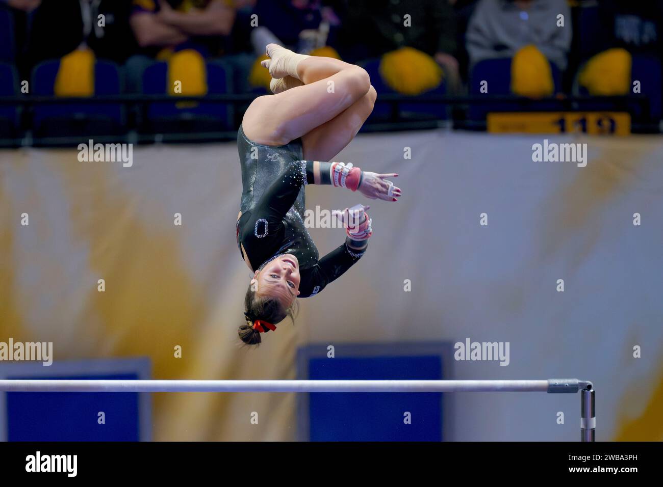 Ohio State redshirt sophomore Tory Vetter performs an uneven bars ...