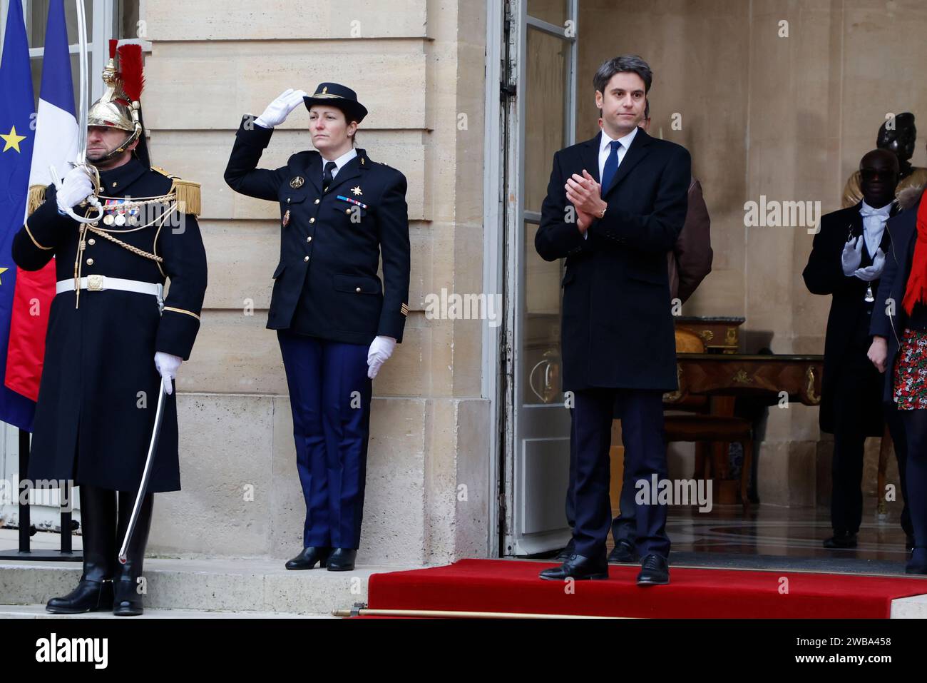 Paris, France. 9th Jan, 2024. Gabriel Attal (3rd, L) attends the ...