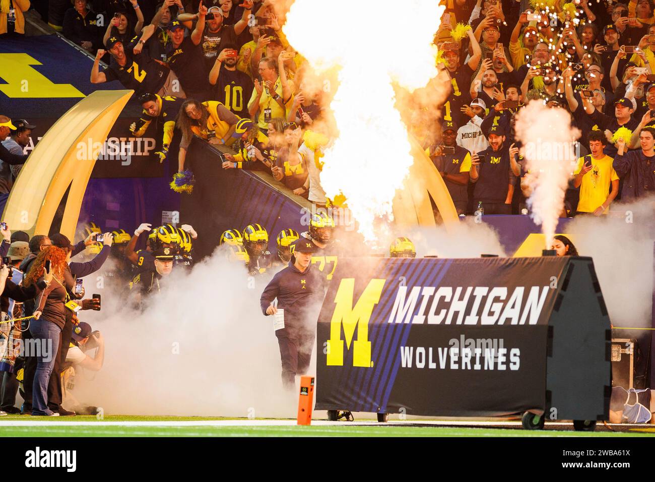 January 08, 2024: Michigan Wolverines players take the field during ...