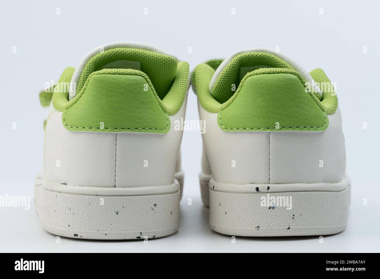 Pair of leather white with green shoes back rear view isolated Stock ...
