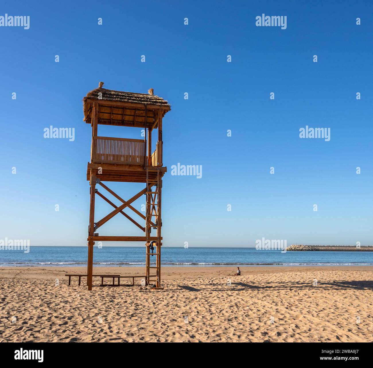 Wooden lifeguard tower on Agadir beach on a warm, sunny day with deep ...