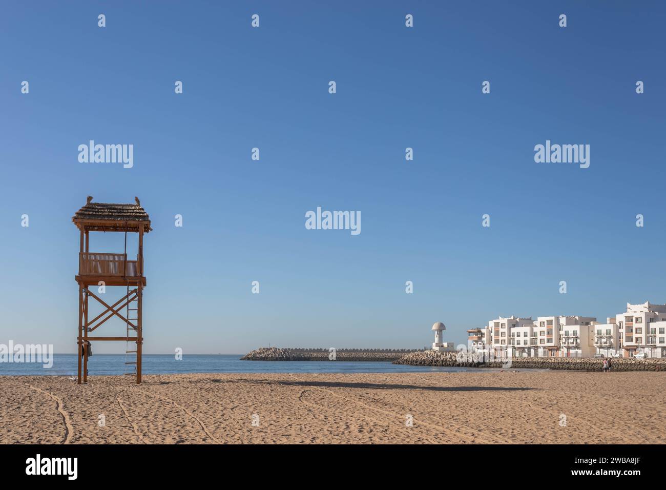 Wide-angle view of Agadir's sandy beach and the wooden lifeguard tower ...