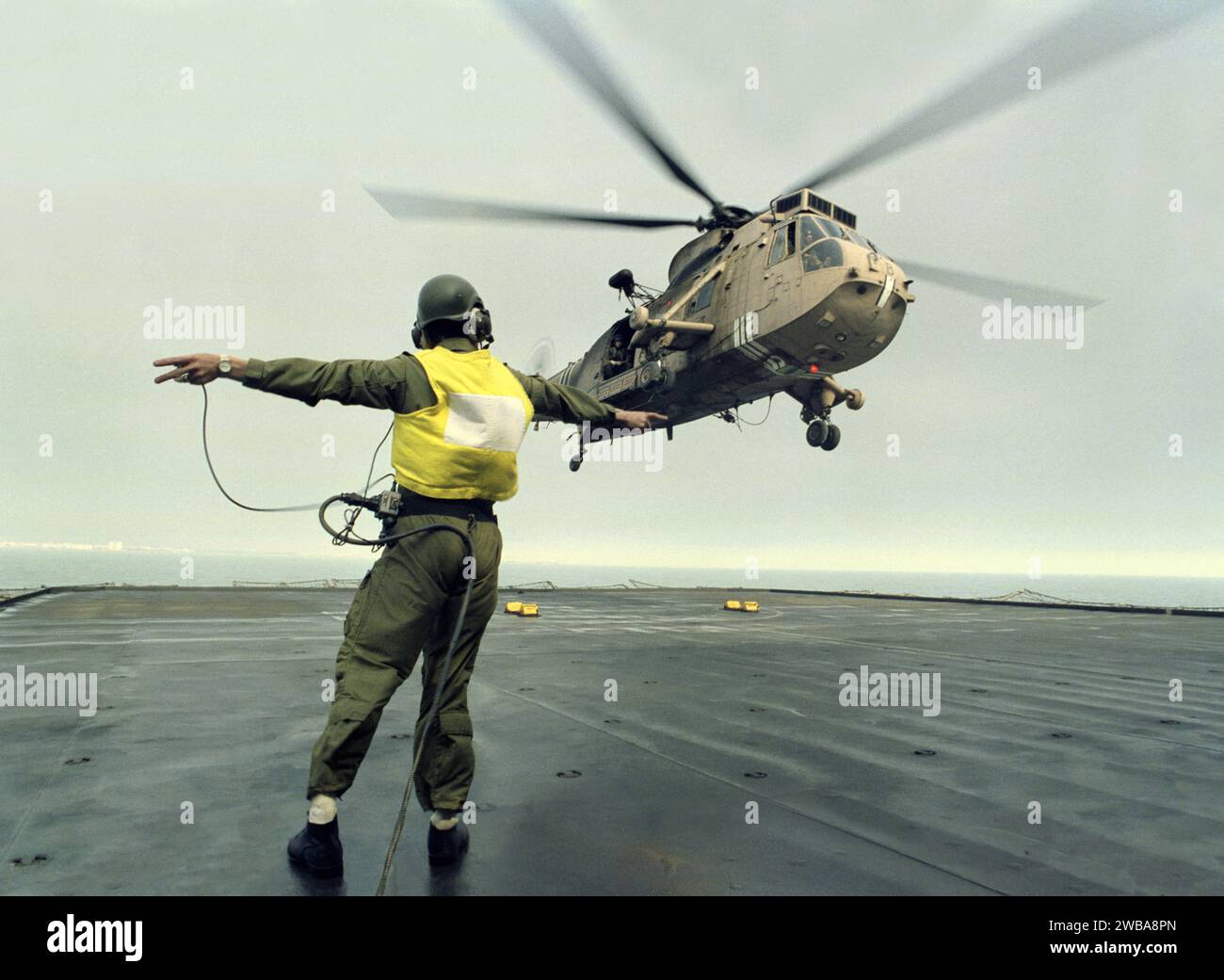 First Gulf War: 20th March 1991 An aircraft handler signals to an 845 ...