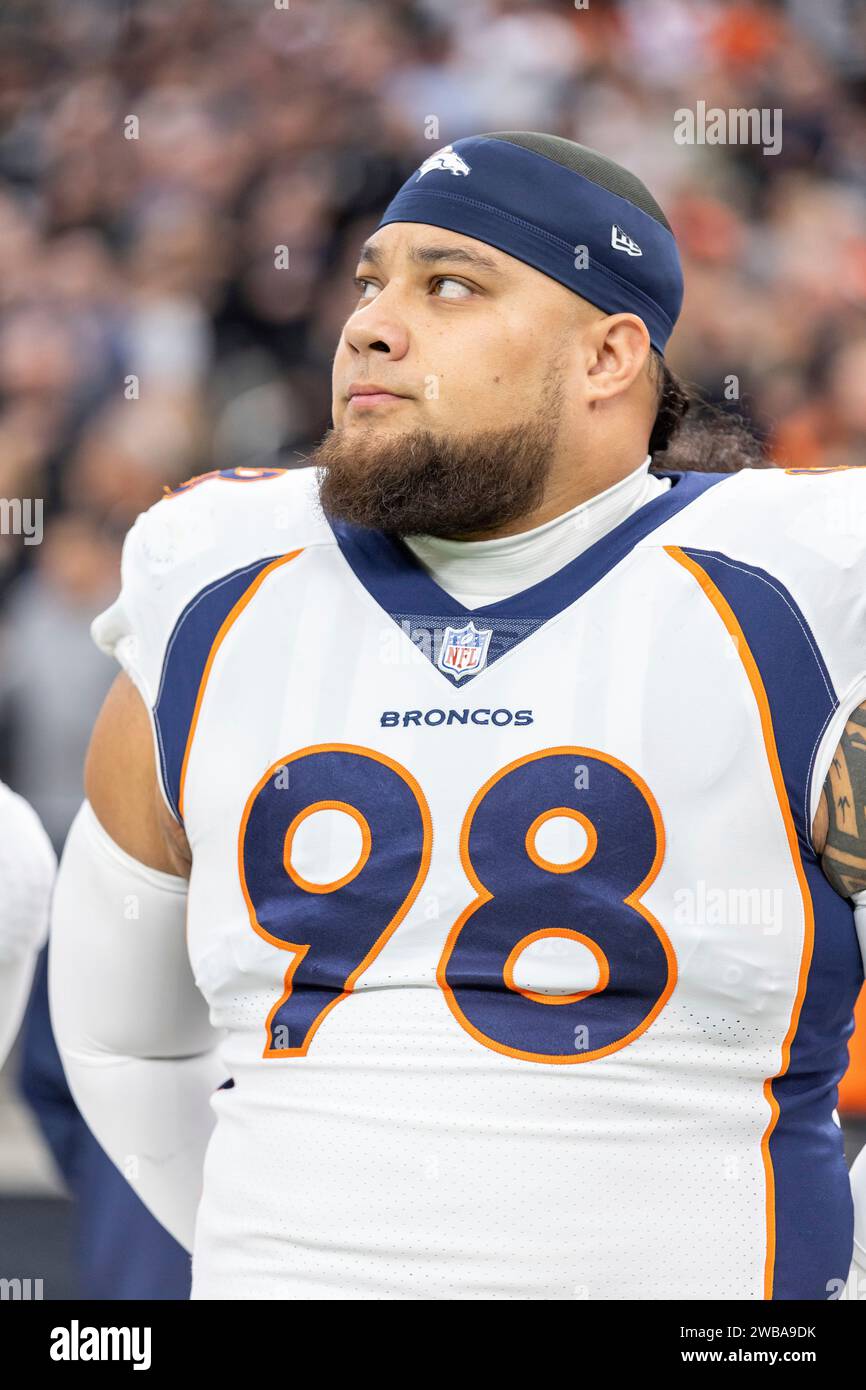 Denver Broncos defensive lineman Mike Purcell (98) stands for the ...