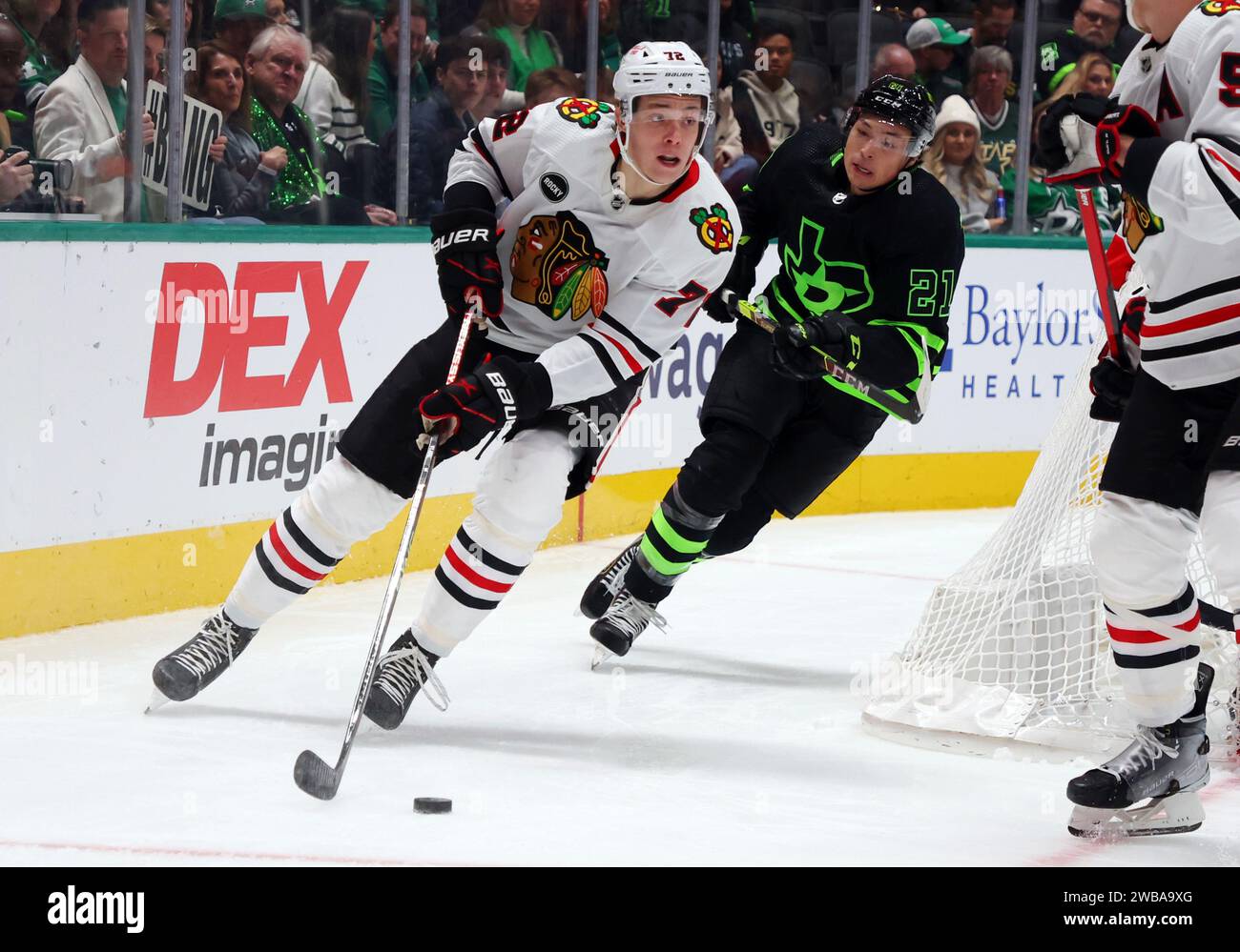 Chicago Blackhawks defenseman Alex Vlasic (72) controls the puck as ...