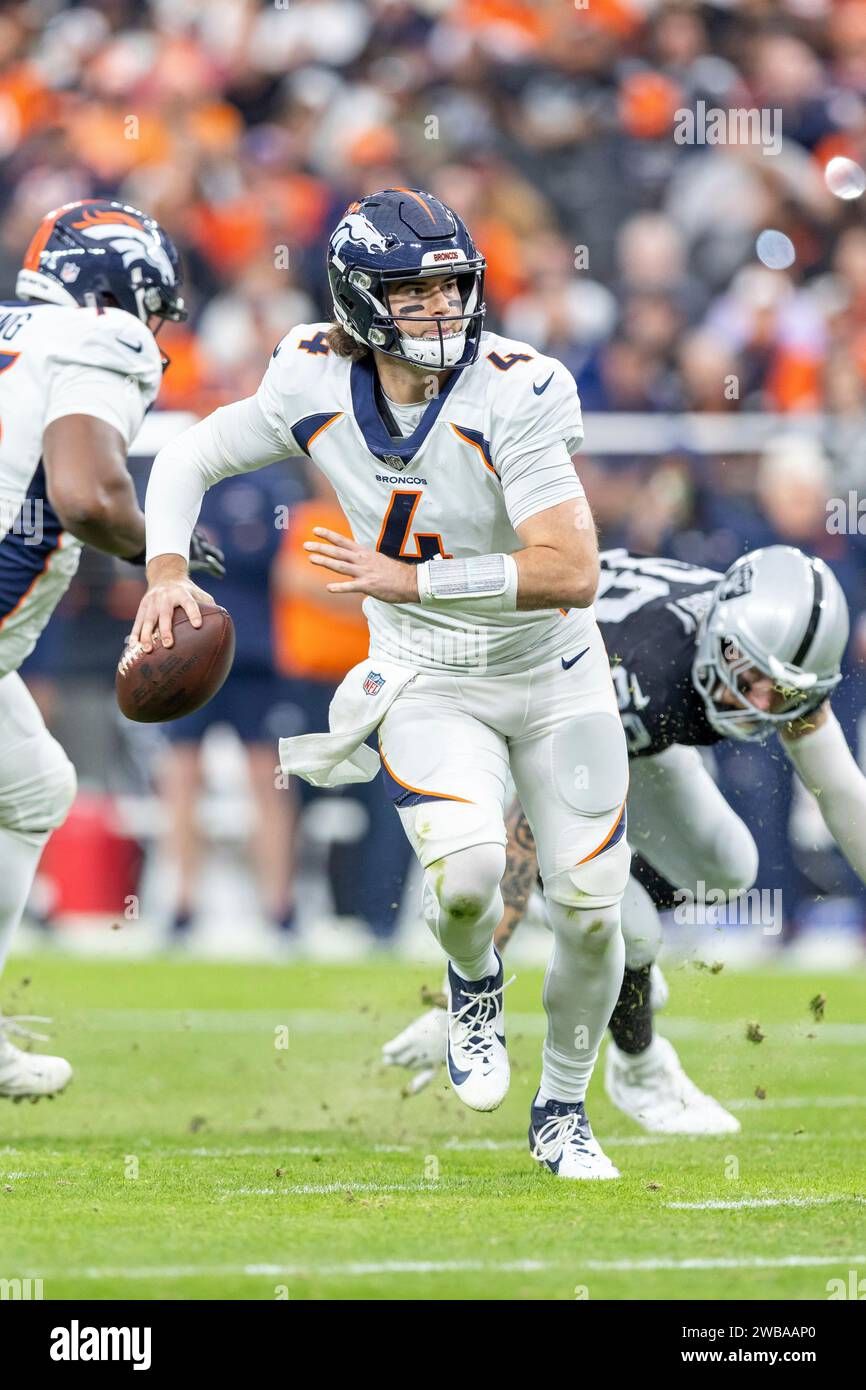 Denver Broncos quarterback Jarrett Stidham (4) passes the ball against the Las Vegas Raiders in ...