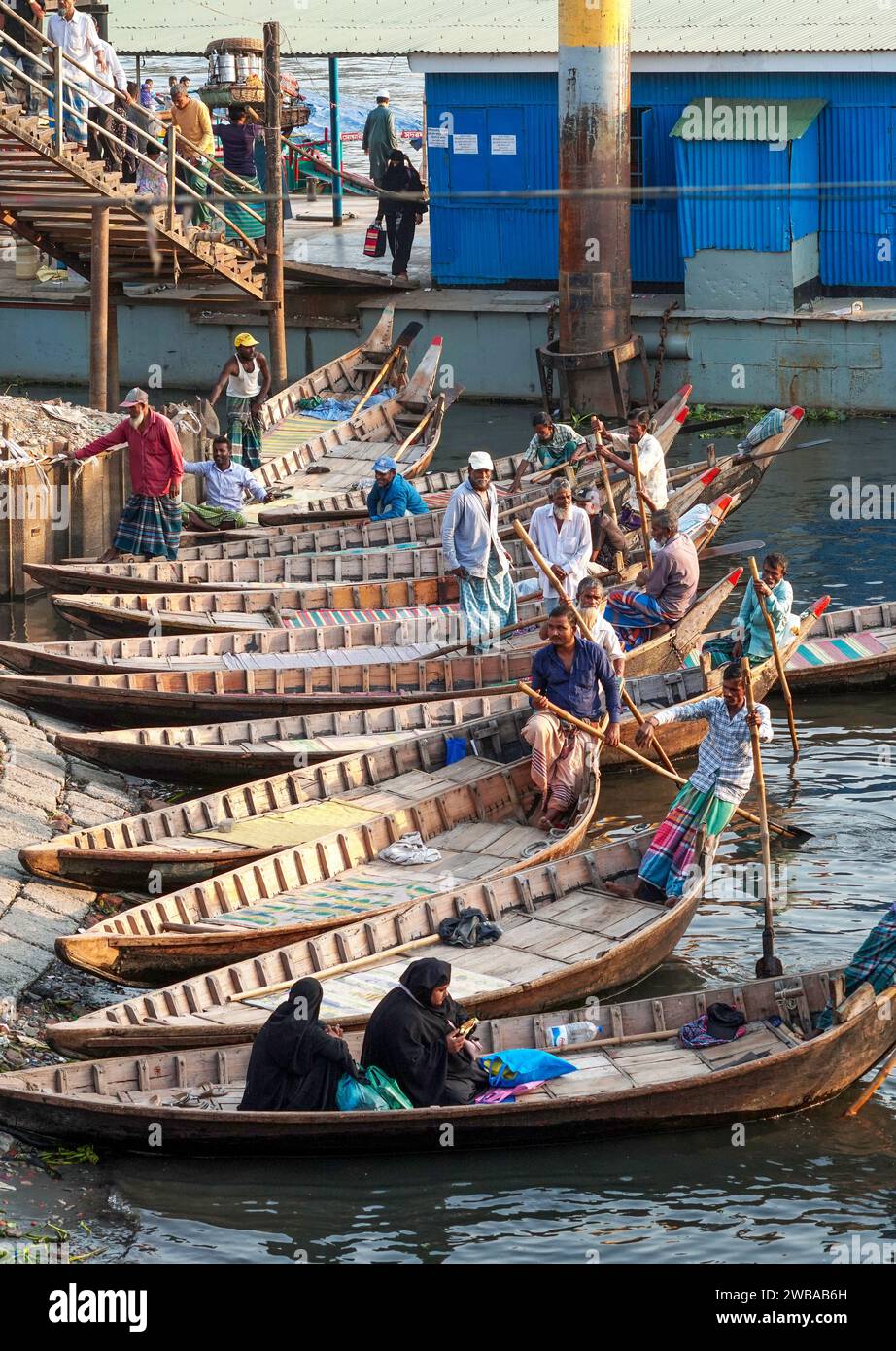 Open wooden ferry boats on the Buriganga River in Dhaka Bangladesh Stock Photo - Alamy