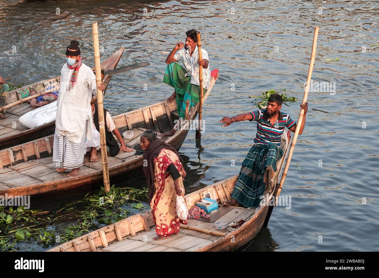 Open wooden ferry boats on the Buriganga River in Dhaka Bangladesh Stock Photo - Alamy