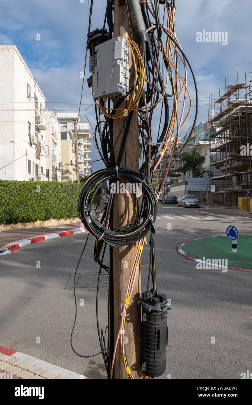 wires on a pole, hub box for connecting house cables to fast internet ...