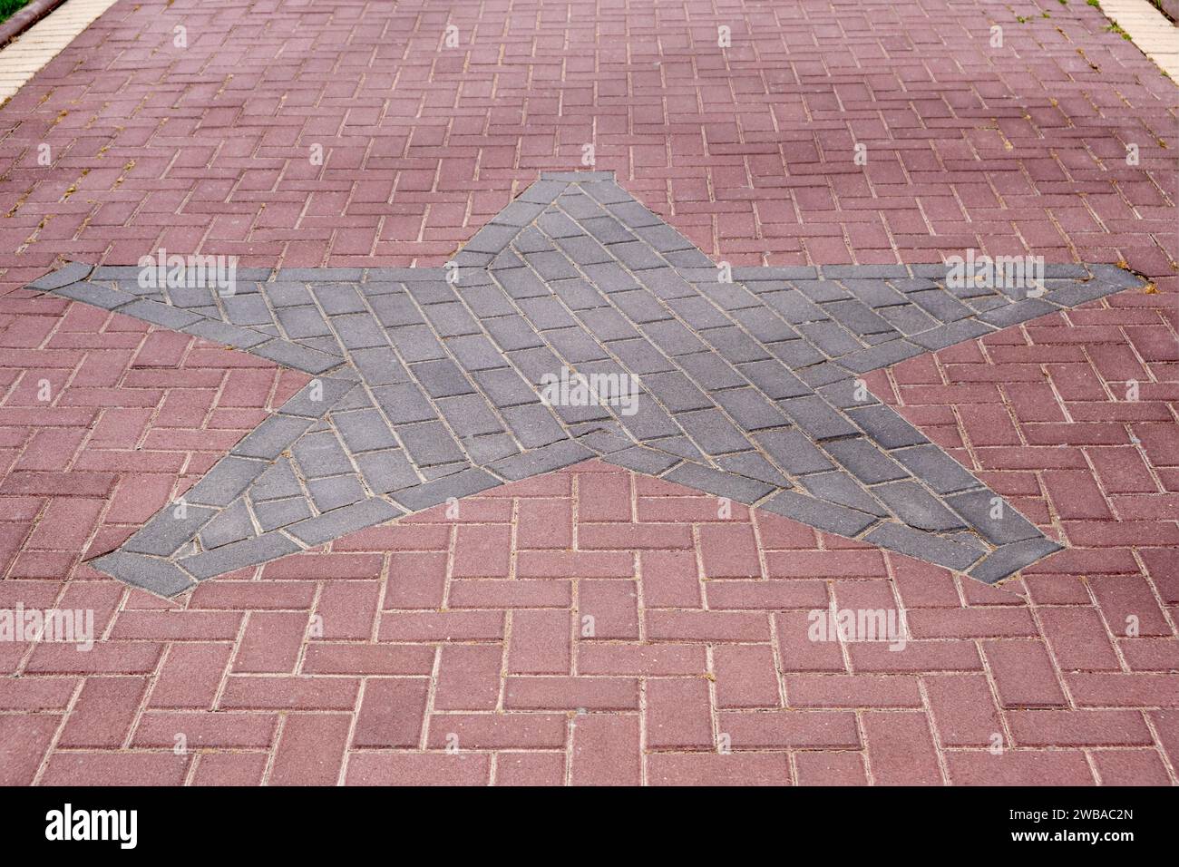 Street tiles in the shape of a five-pointed star, pattern on the ...
