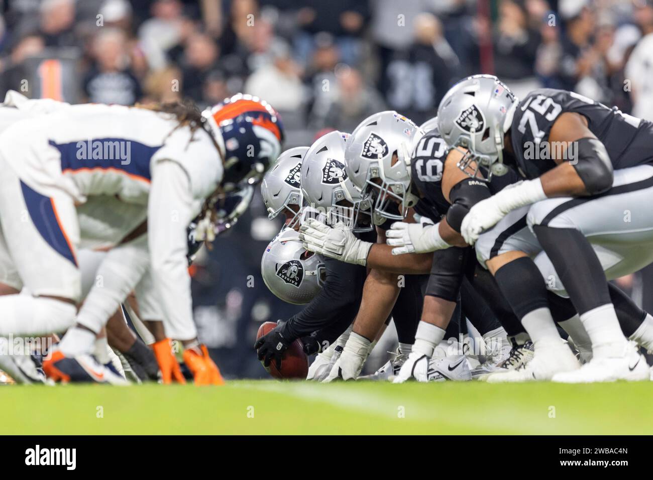 The Las Vegas Raiders line up against the Denver Broncos in an NFL ...