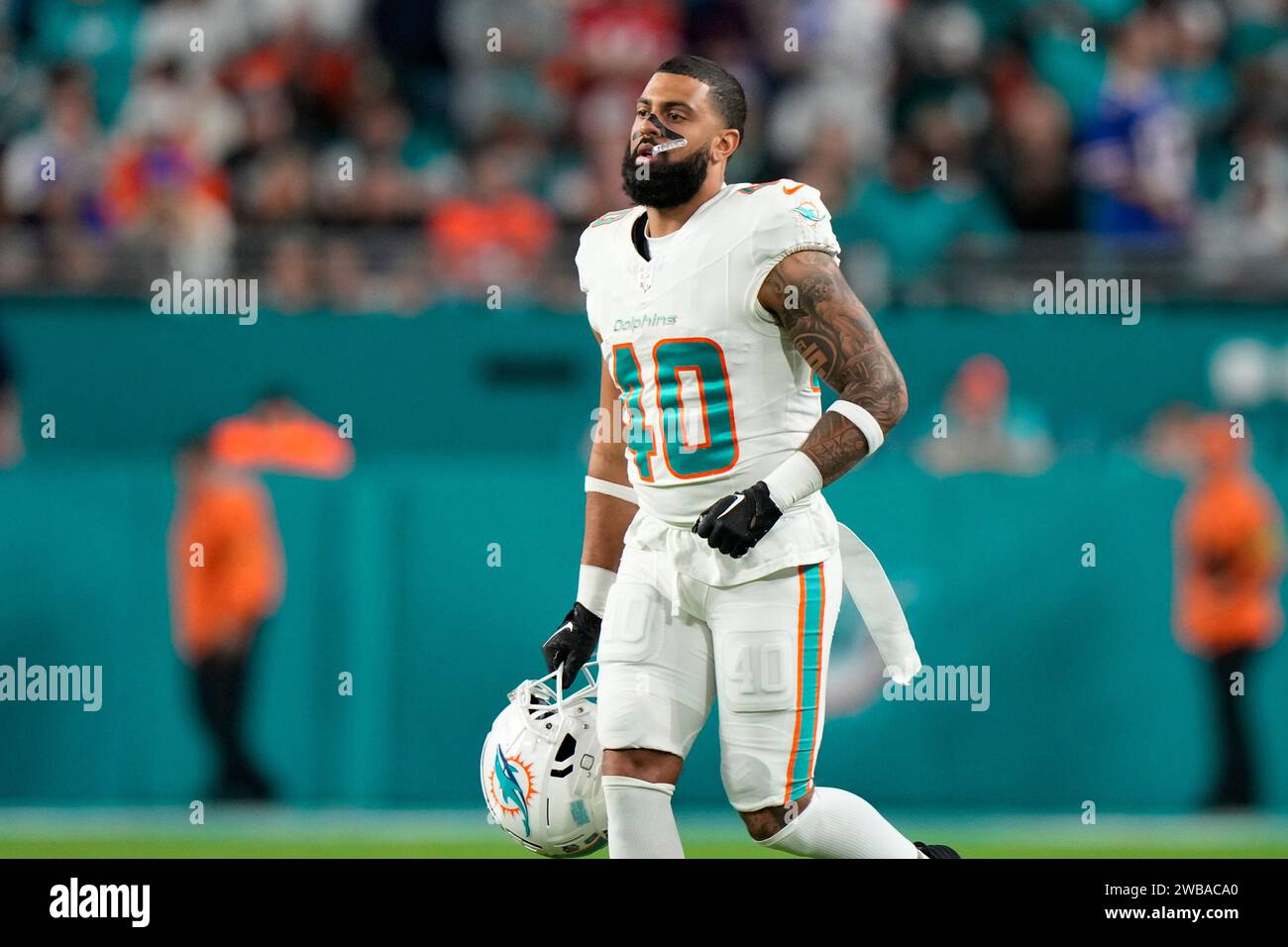 Miami Dolphins cornerback Nik Needham runs on the field during the ...
