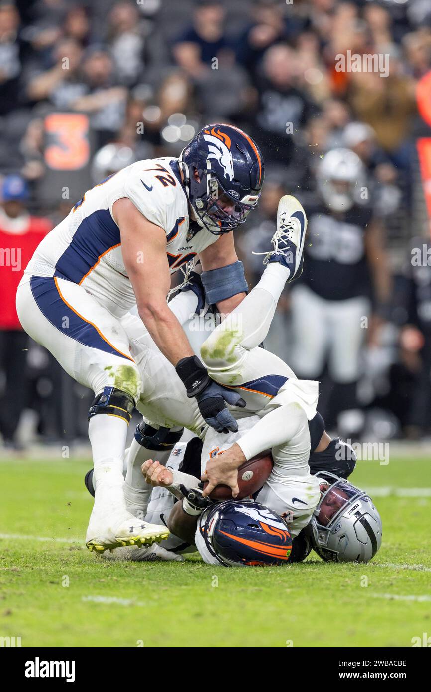 Las Vegas Raiders defensive end Malcolm Koonce (51) sacks Denver Broncos quarterback Jarrett ...