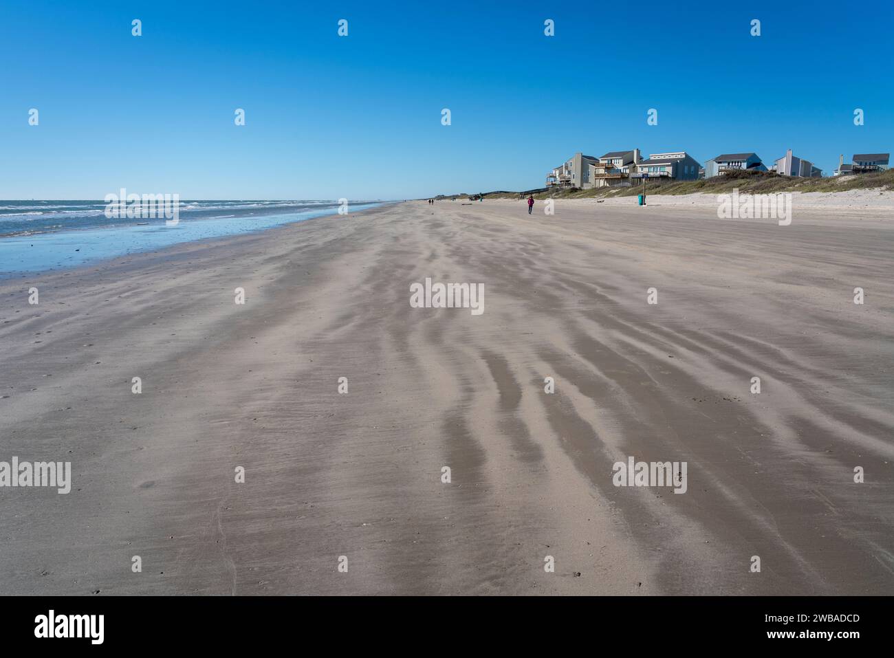 At risk homes on Mustang Island beach near Port Aransas, Texas Stock ...